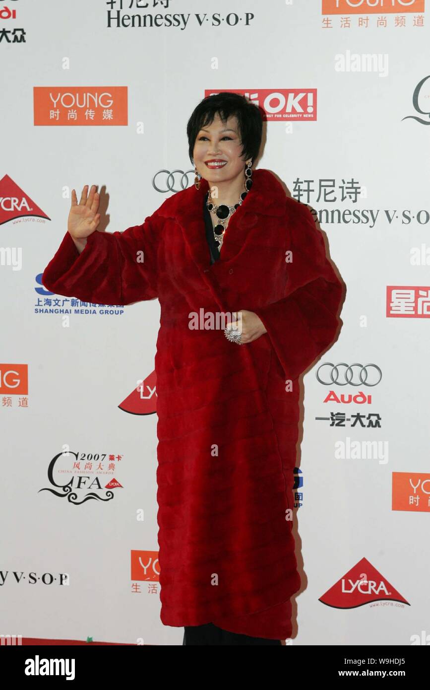 Yue Sai Kan, CEO of Yue-Sai Cosmetics, poses on the red carpet before ...