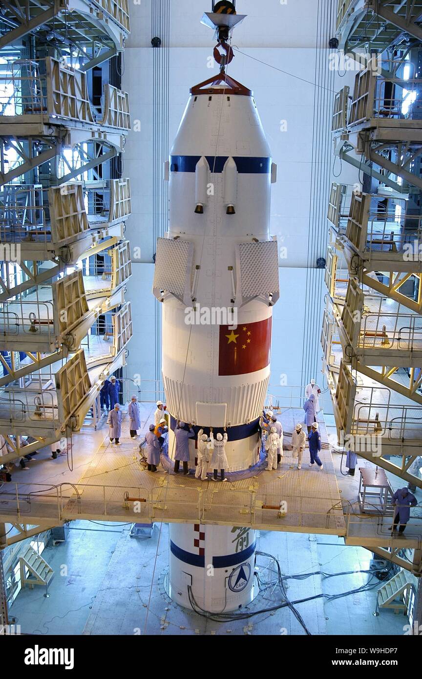 Shenzhou V manned spacecraft is fixed on a Long March 2F (CZ-2F) rocket at at the Jiuquan ...
