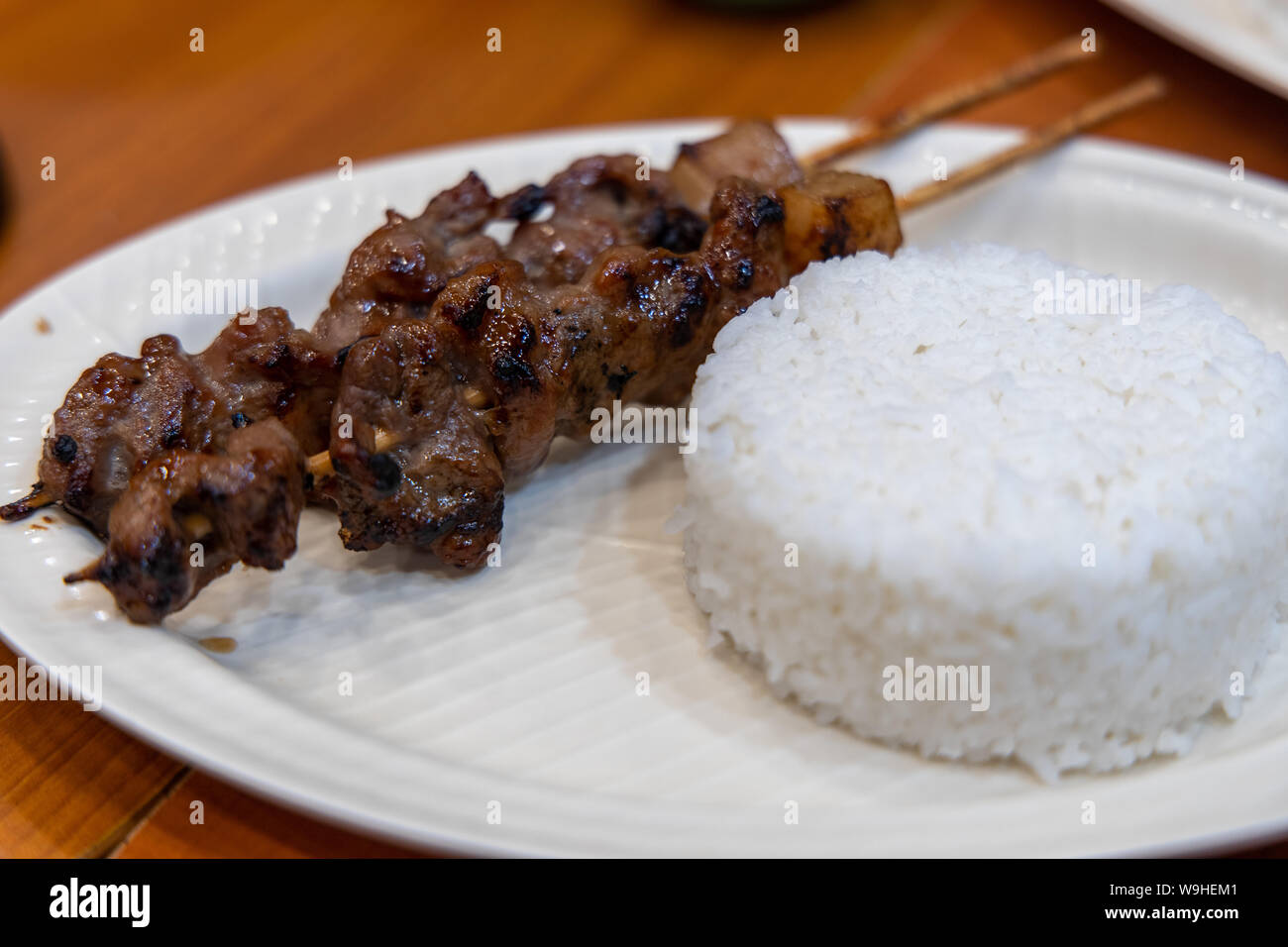 pork barbecue with rice on the plate Stock Photo - Alamy