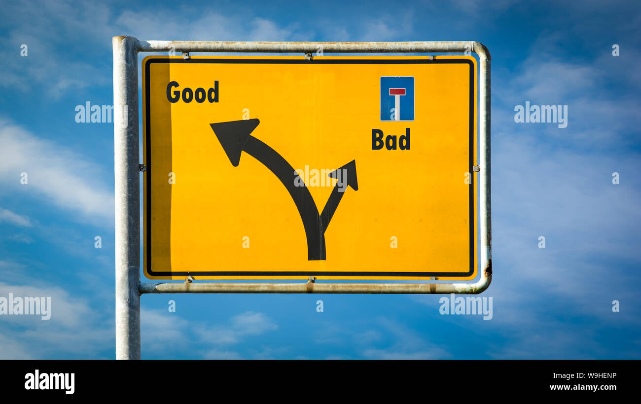 Street Sign the Direction Way to Good versus Bad Stock Photo - Alamy