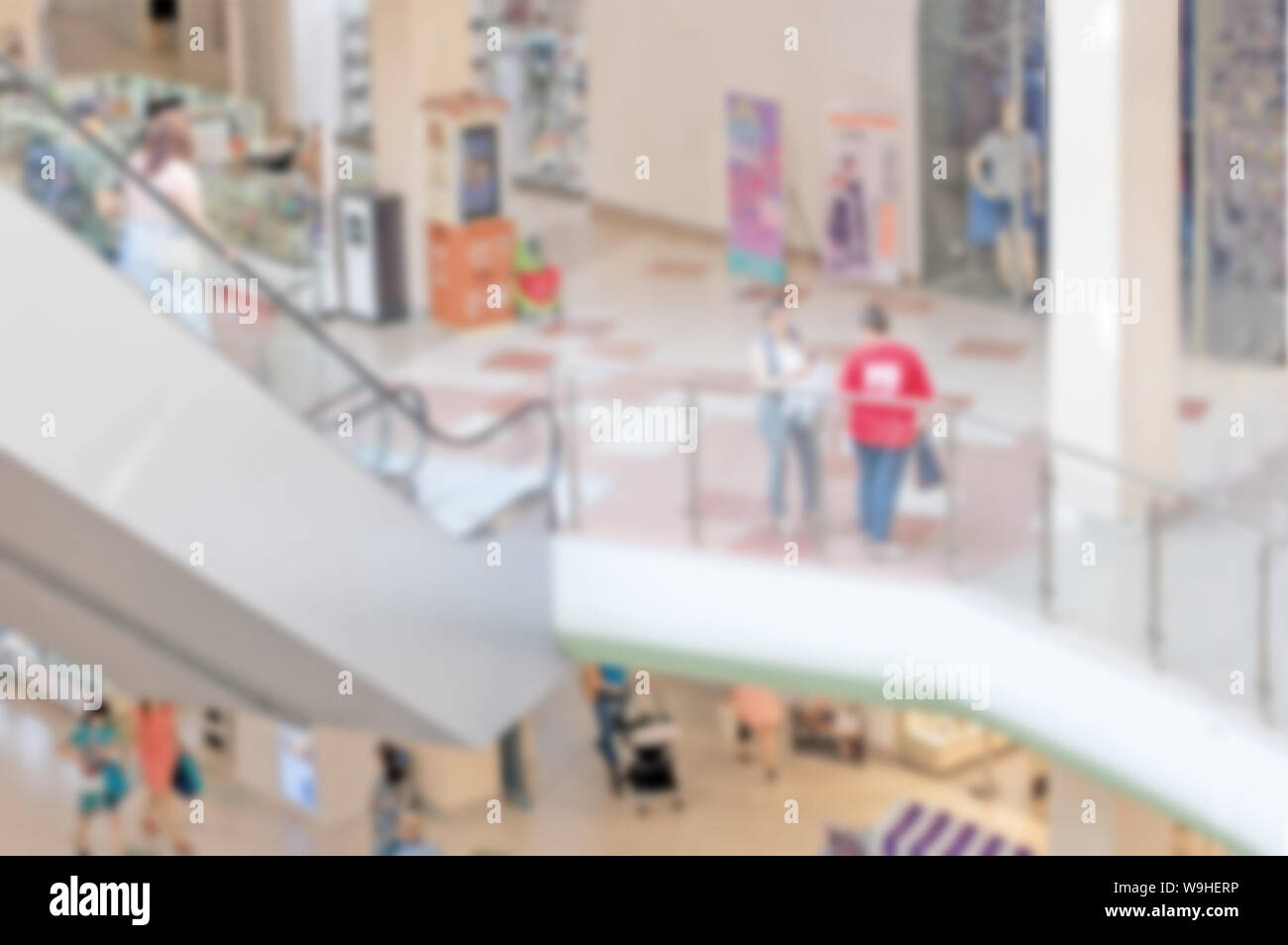 Many shops in the mall with escalator, Background of modern store ...