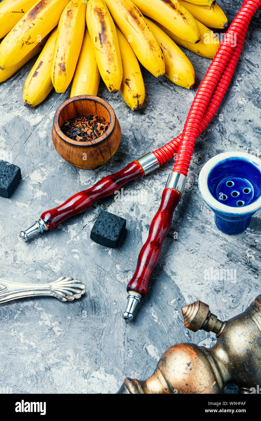 Tobacco shisha with banana flavor.Turkish nargile with banana.Fruit ...