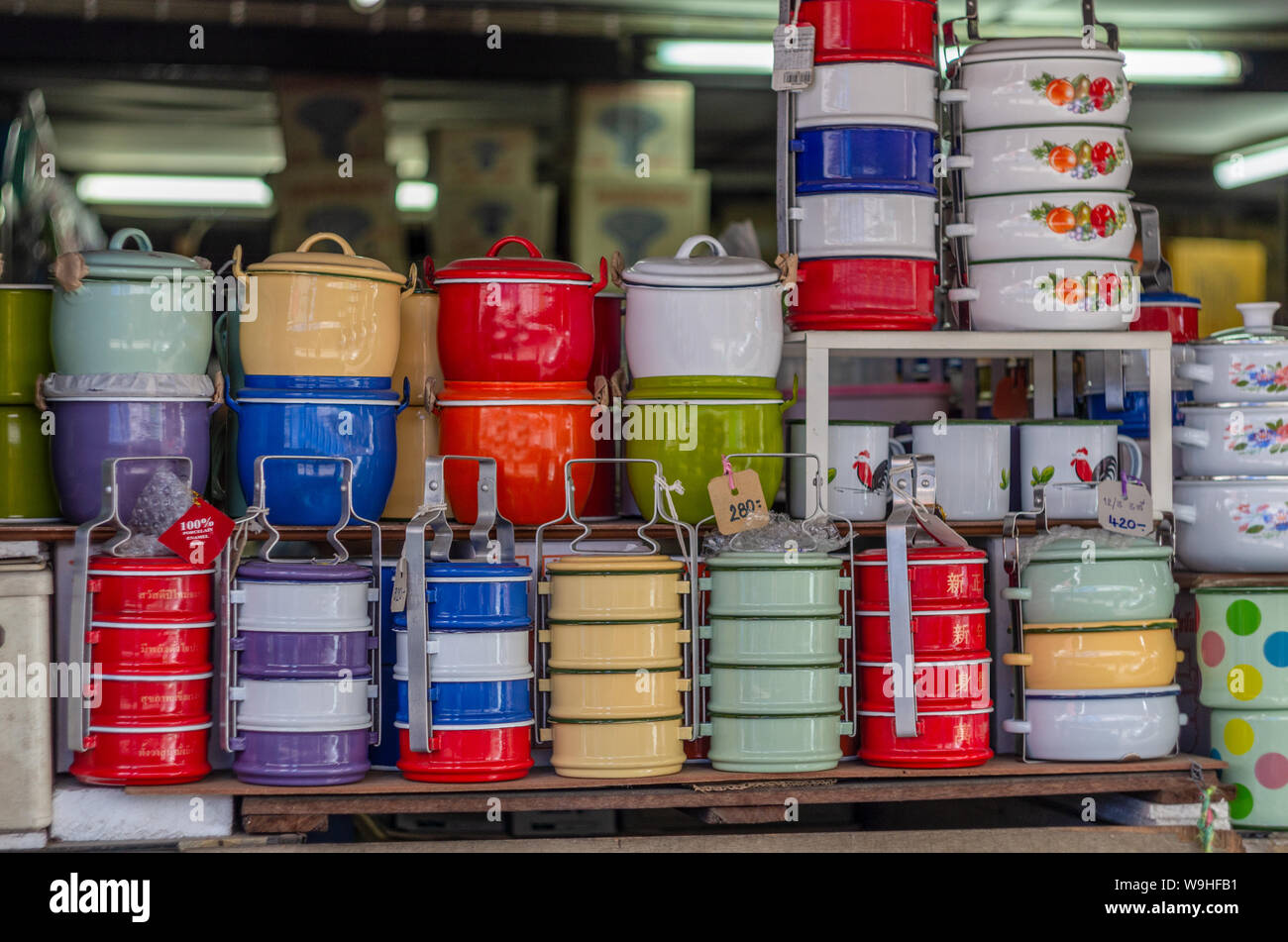 Enamel porcelain dishes and pots multicolor old style Stock Photo - Alamy