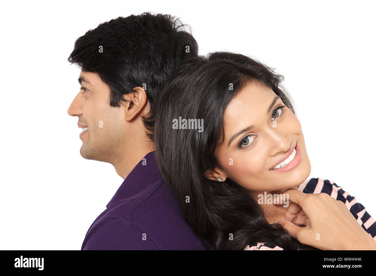 Young couple smiling back hi-res stock photography and images - Alamy