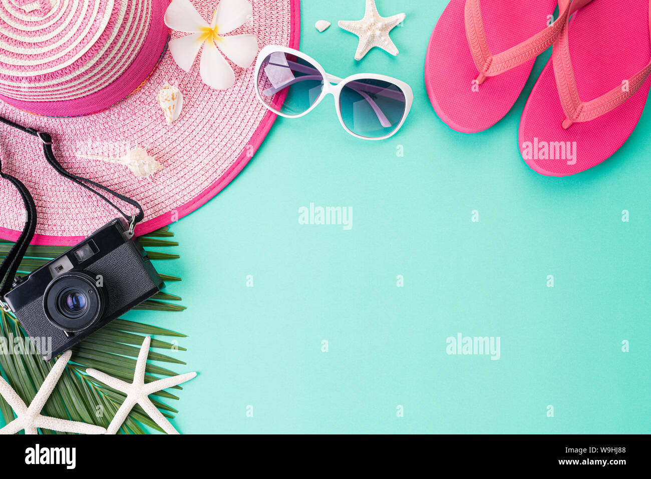 Beach accessories retro film camera, sunglasses, flip flop, starfish ...