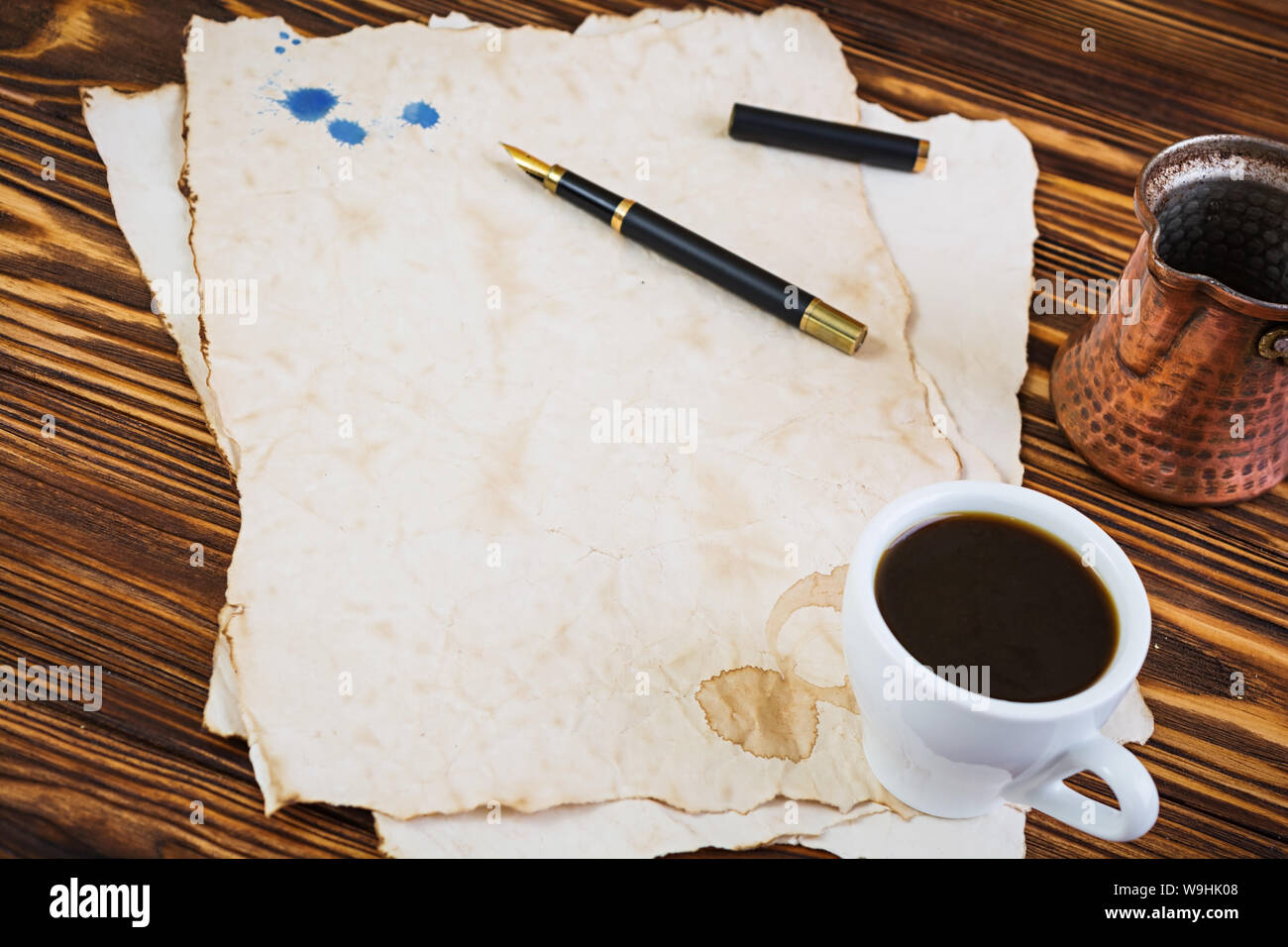 Background of a cup of coffee on an old paper Stock Photo - Alamy