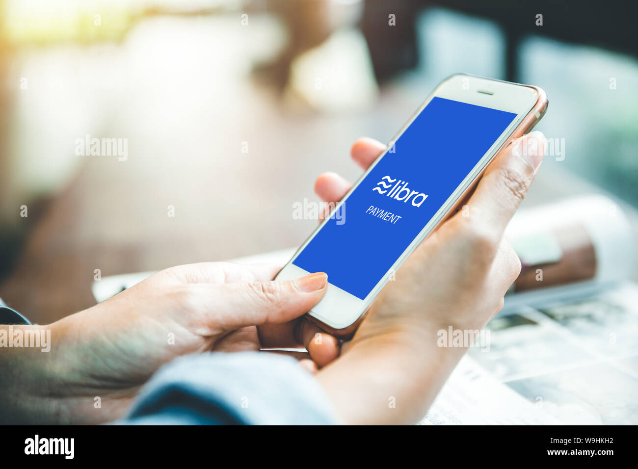 Facebook Libra coin logo icon on smartphone screen, new internet ...