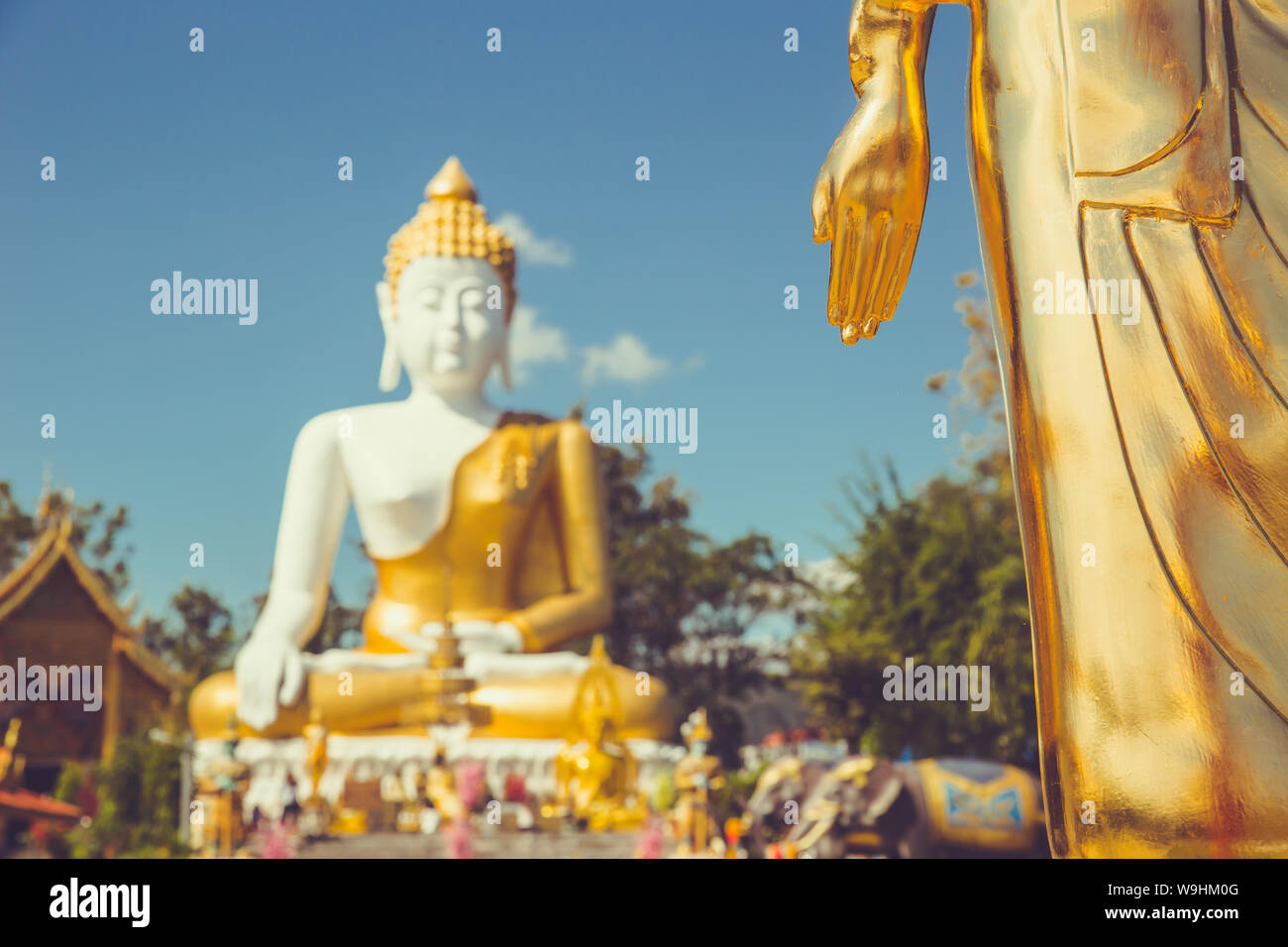 Buddha statue outdoor in Thai temple vintage color tone travel landmark ...