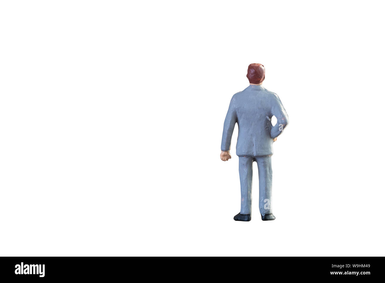Close up of Miniature businessman people isolated with clipping path on ...