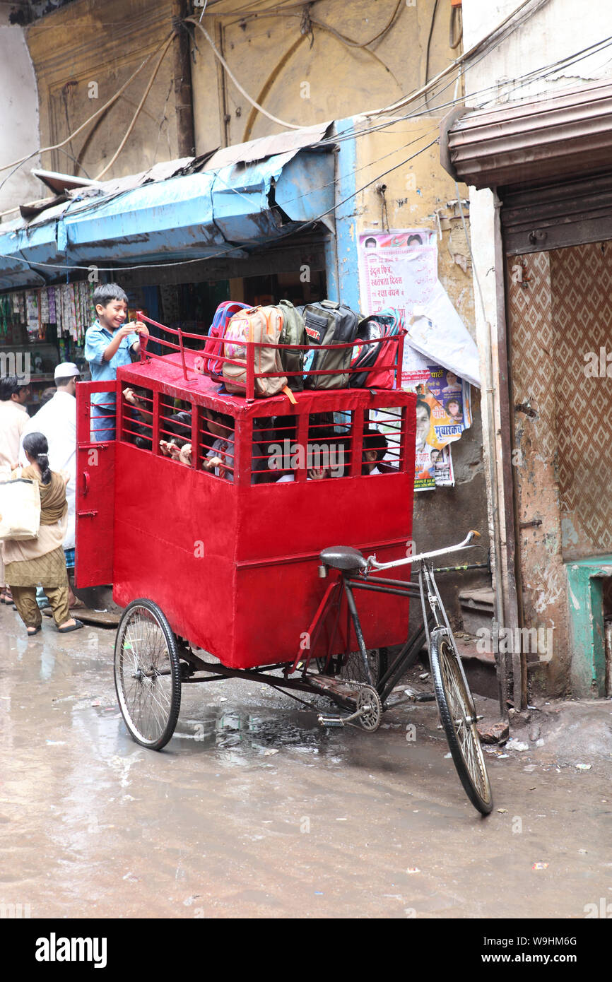 Schoolchildren in a school rickshaw, India Stock Photo - Alamy