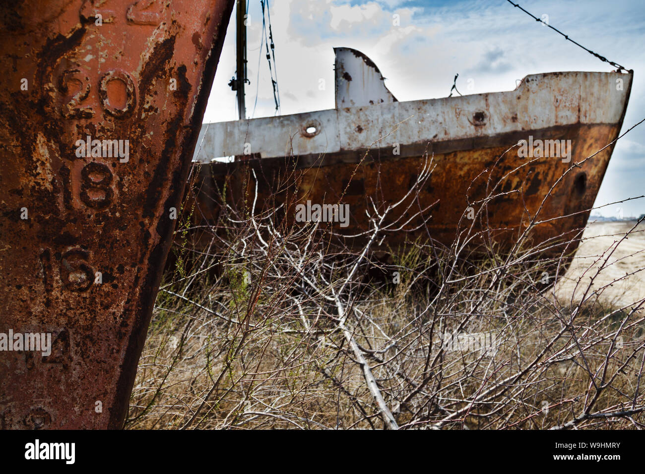 Old rusty river ship on the shore Stock Photo - Alamy