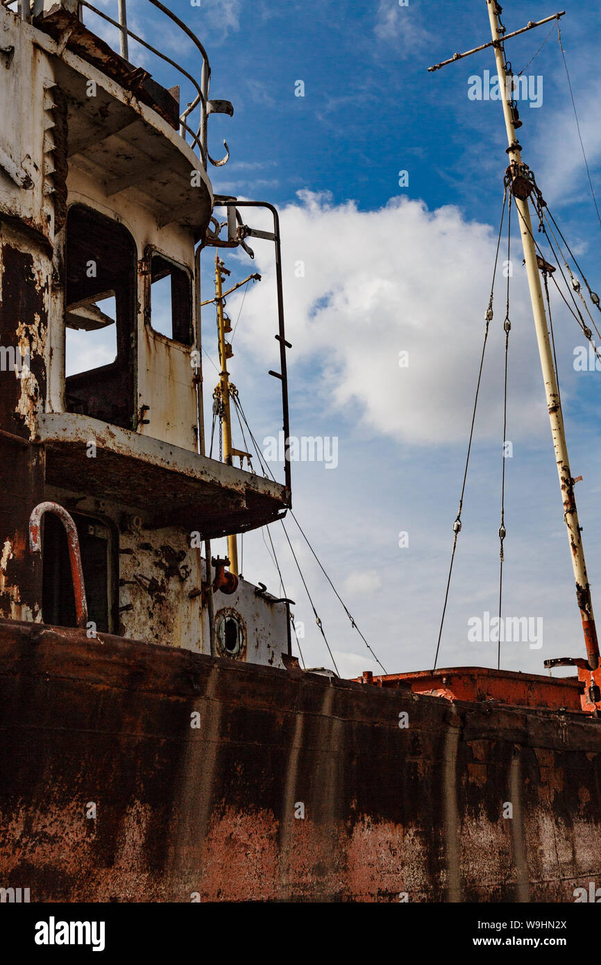 Old rusty river ship on the shore Stock Photo - Alamy