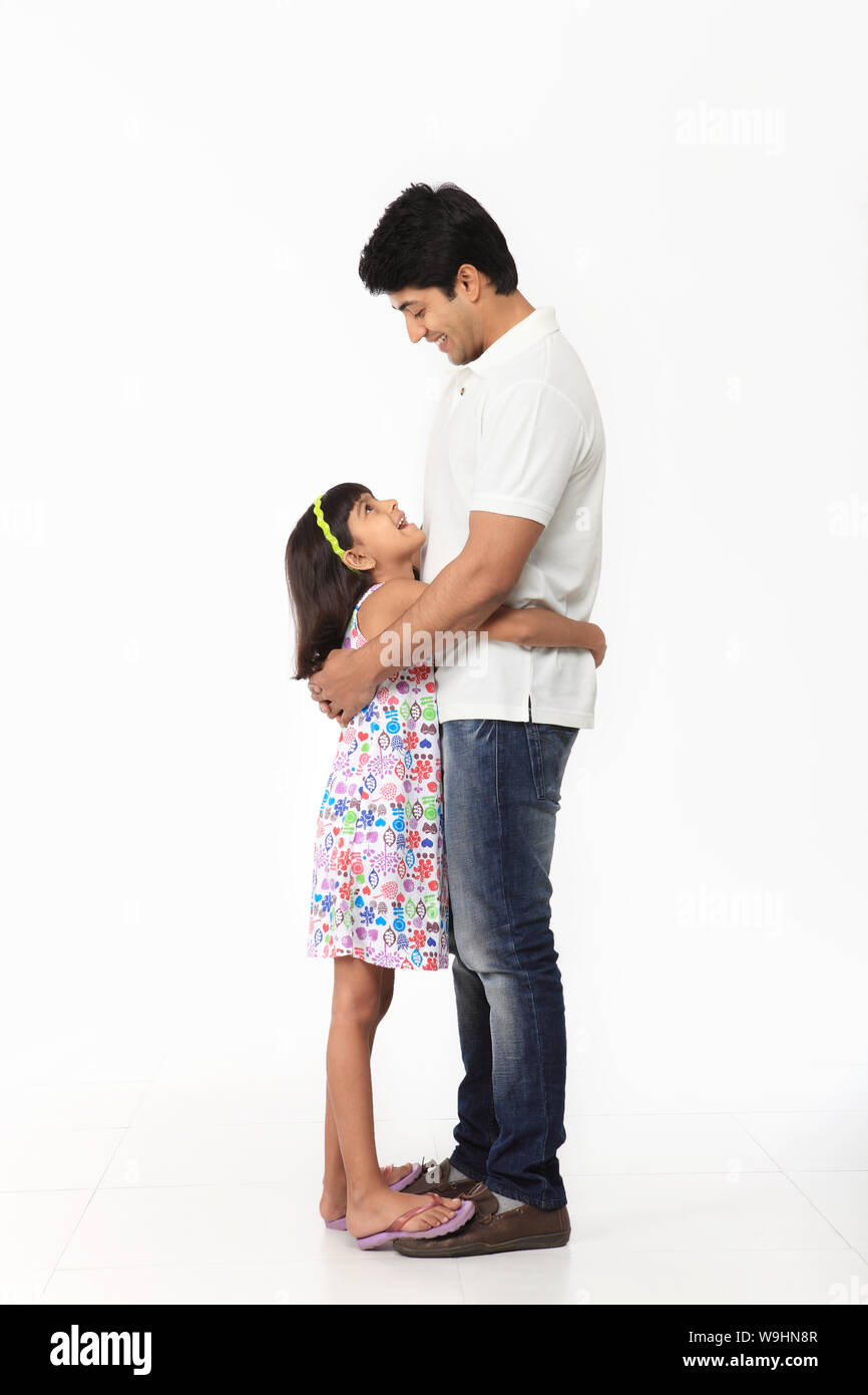 Girl hugging her father hi-res stock photography and images - Alamy