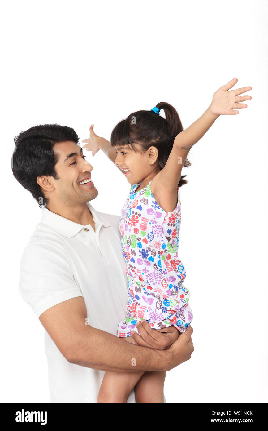 Two girls carrying other hi-res stock photography and images - Alamy