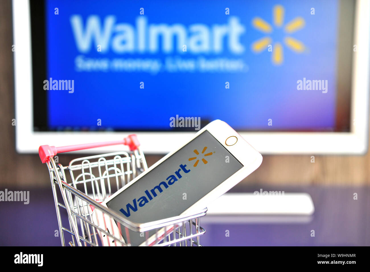 YAROSLAVL, RUSSIA - AUGUST 13, 2019: Walmart logo in mobile phone and ...