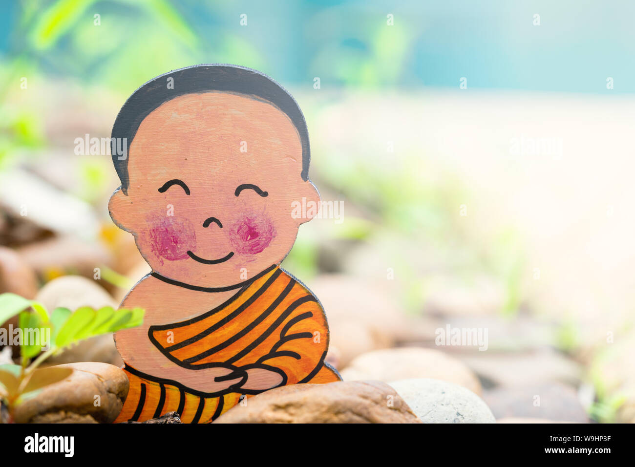 Little boy Buddhist, little Buddha, Asian, sitting on , rejoicing and ...
