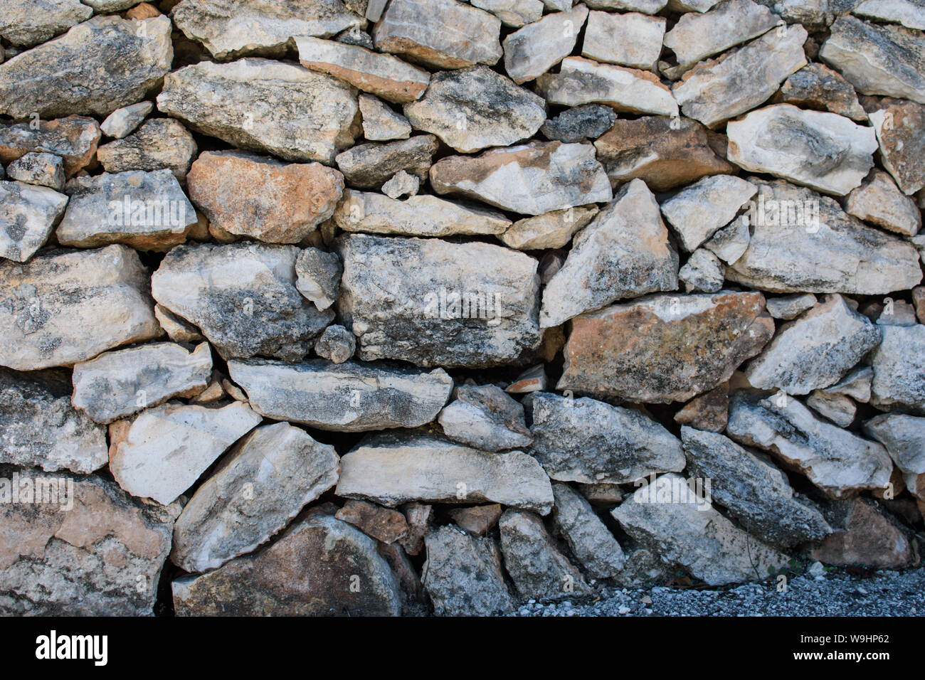 Wall of large natural stones, natural background. Great for design and ...