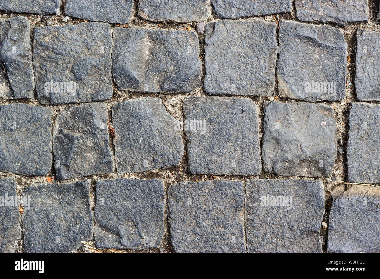 Texture of cobblestone in old town. Ancient gray pavement Stock Photo ...