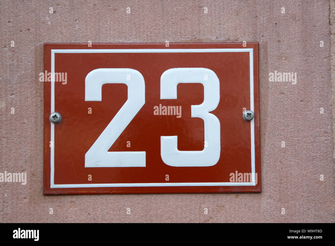 Red Number Twenty-Three on Stone Wall Stock Photo - Alamy