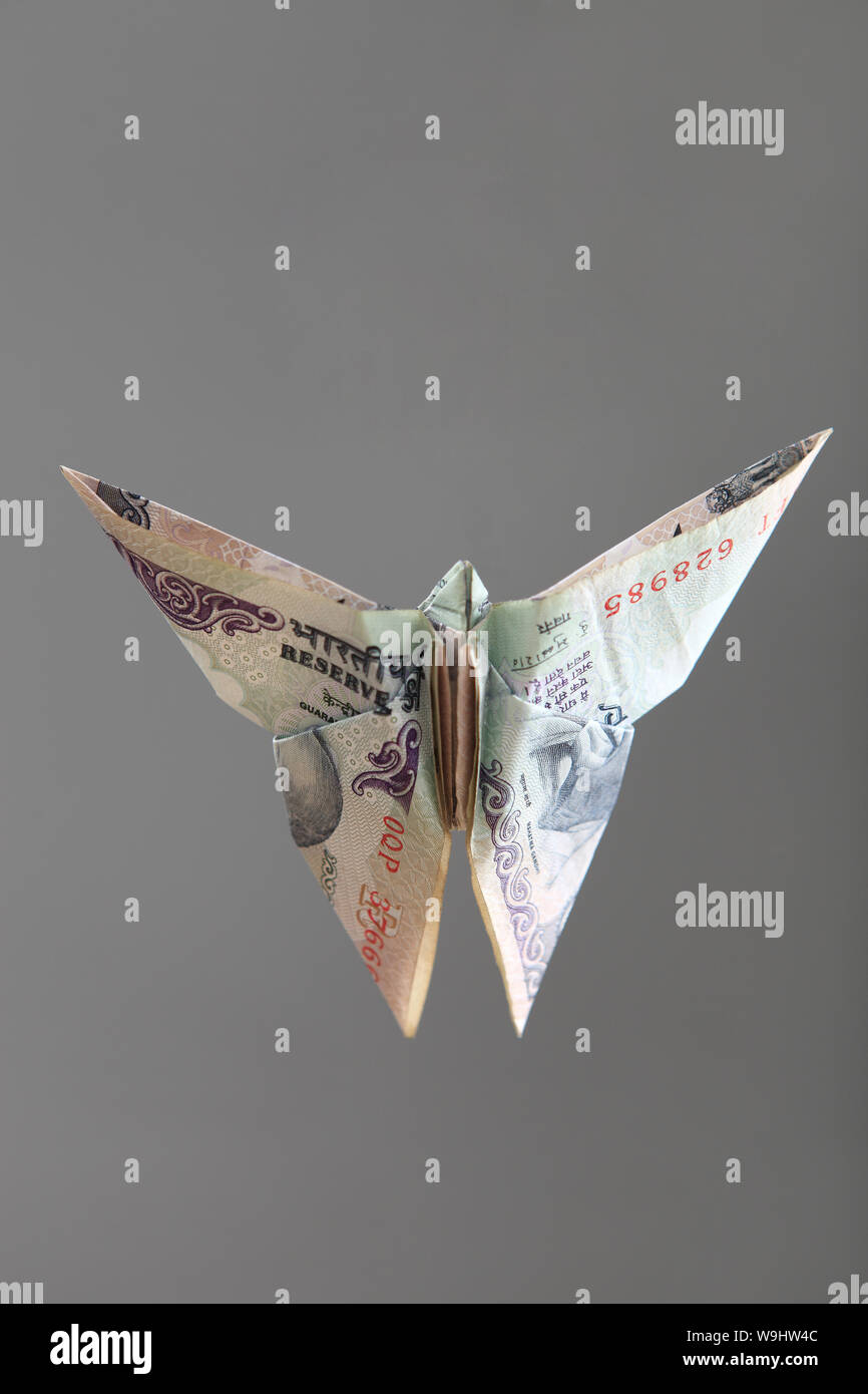 Butterfly of an Indian banknote Stock Photo - Alamy