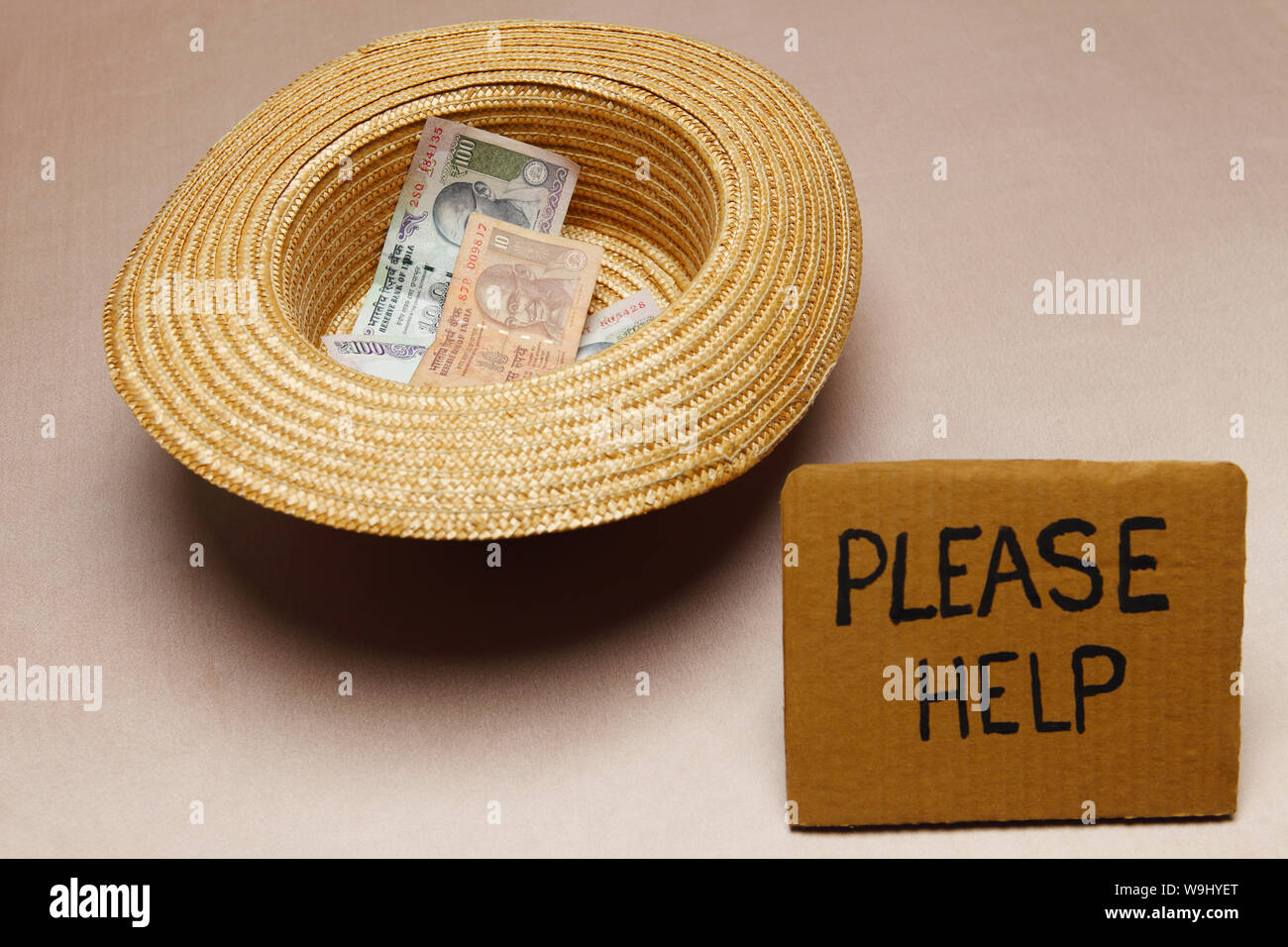 Money collection hat hi-res stock photography and images - Alamy