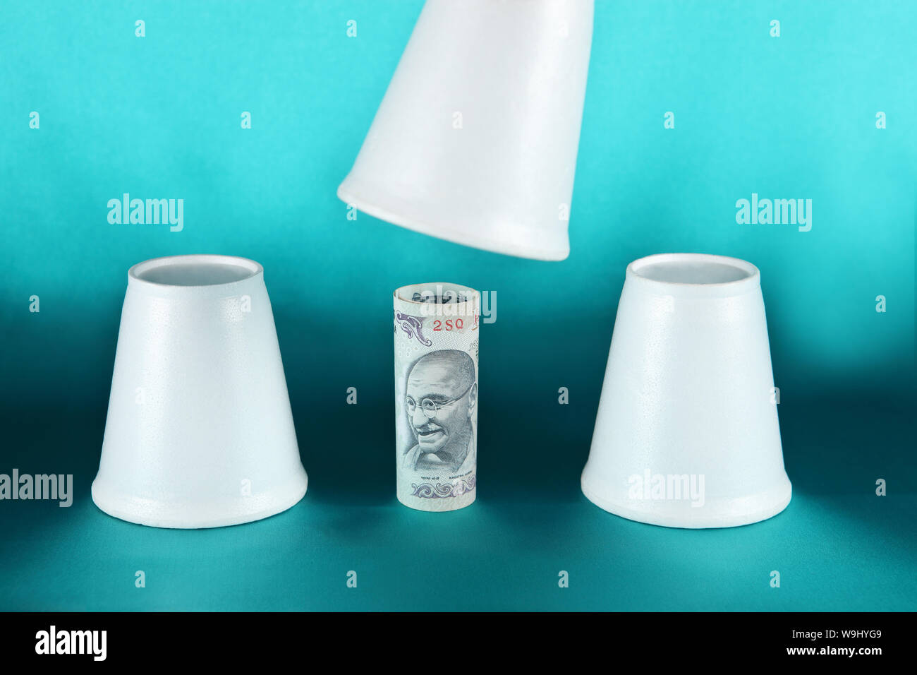 Cup upside down game hi-res stock photography and images - Alamy
