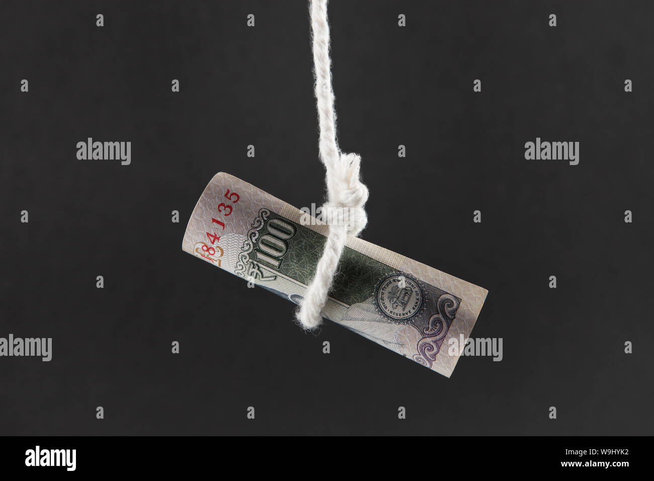 Money hanging by a string hi-res stock photography and images - Alamy