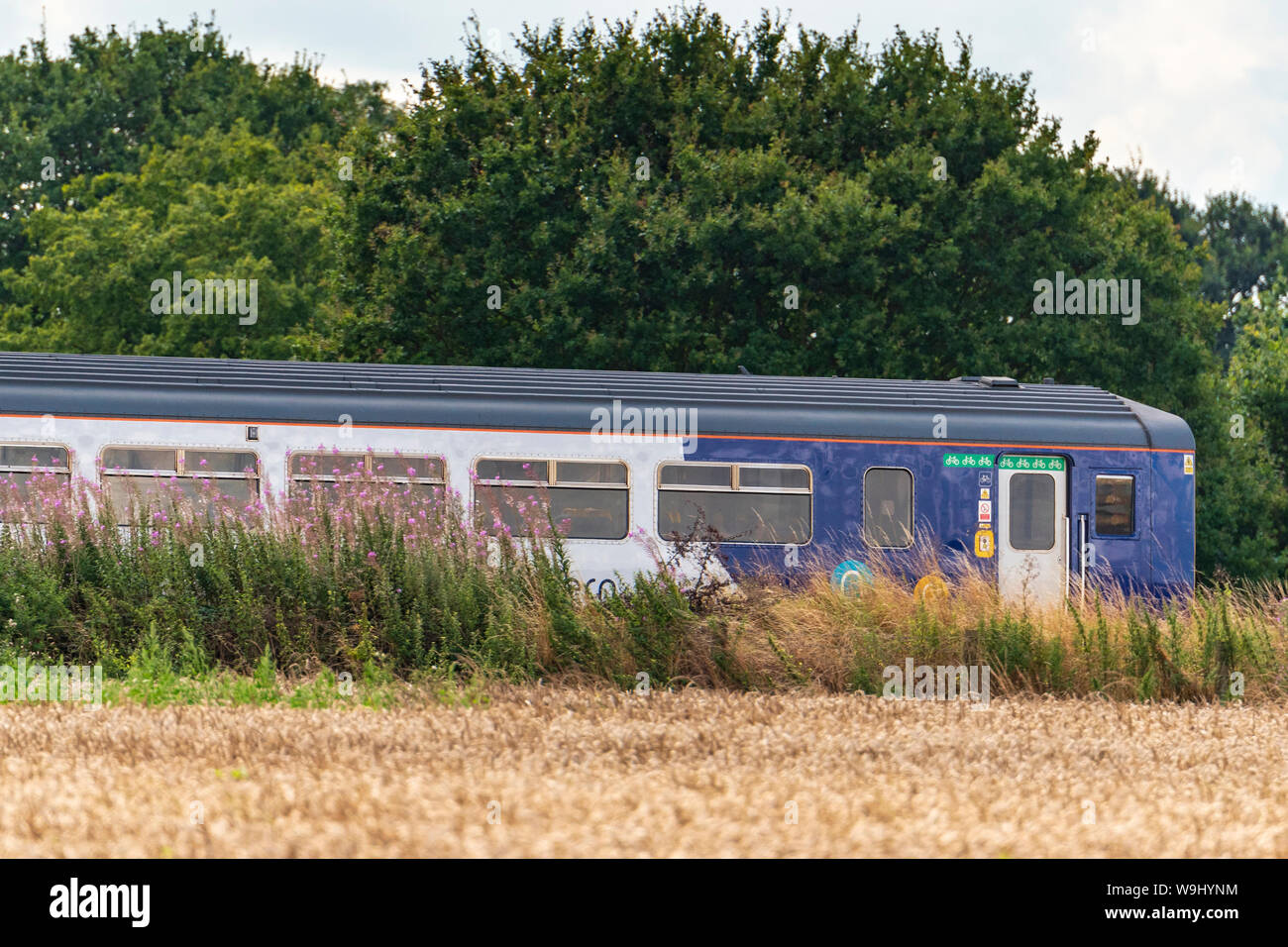 An old sprinter train passing through the countryside Stock Photo - Alamy