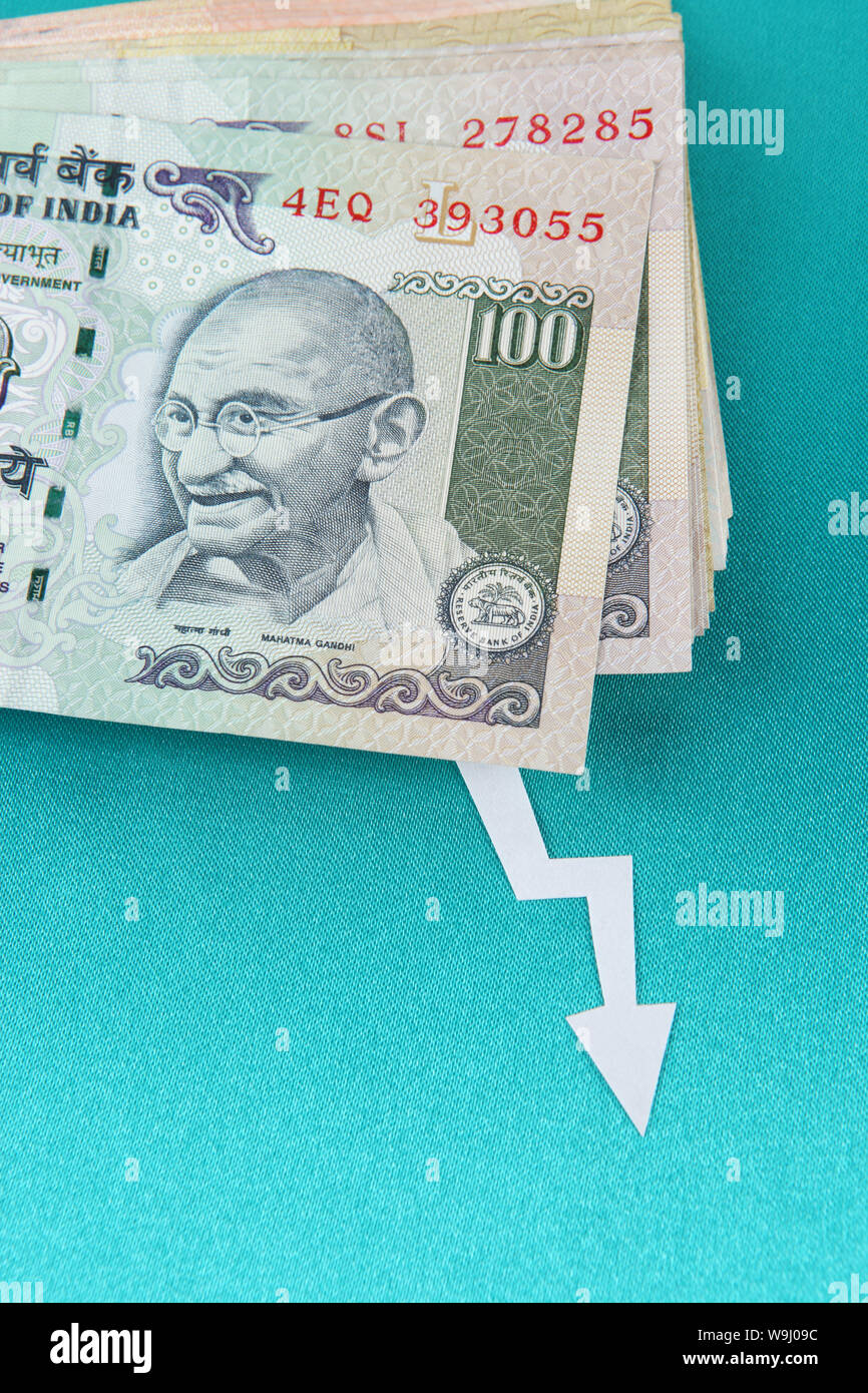 One hundred rupee notes representing loss Stock Photo - Alamy