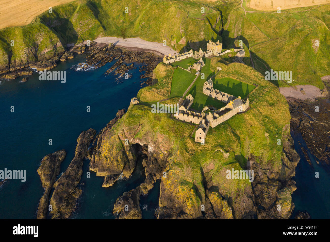 Aerial view of Dunnottar Castle a ruined medieval fortress located upon ...