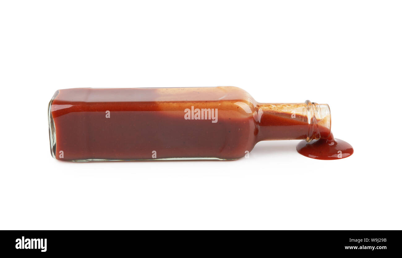 bottle of hot sauce is spilling liquid on white background Stock Photo ...
