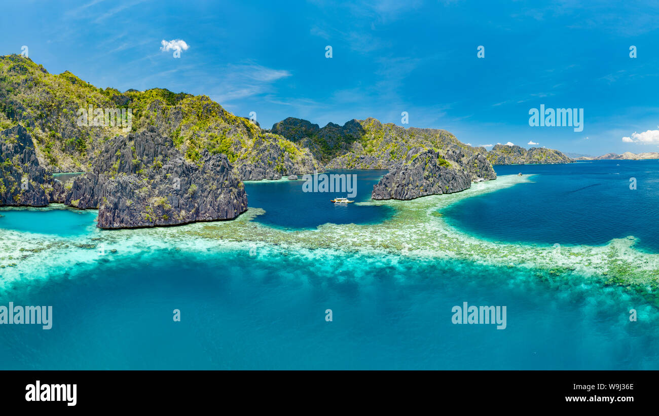 Aerial view of beautiful lagoons and limestone cliffs of Coron, Palawan ...