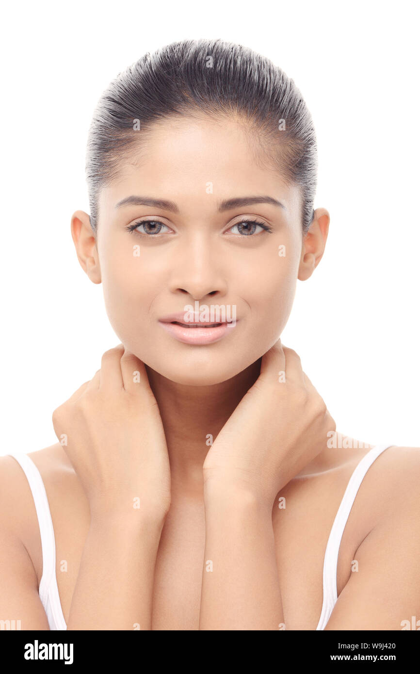 Close up of a woman with her hands on neck Stock Photo - Alamy