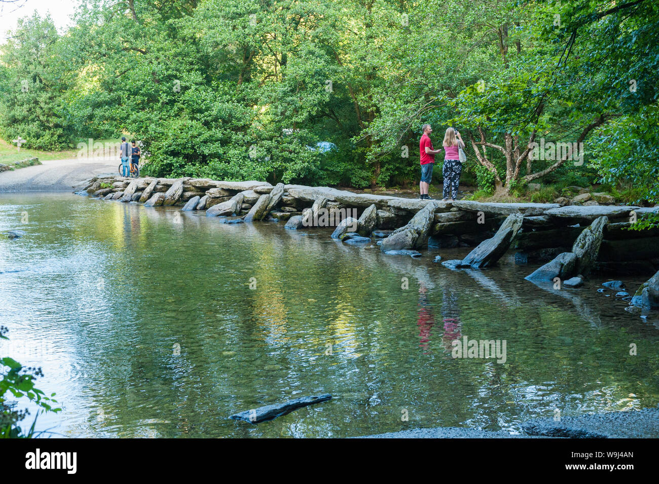 The Tarr steps Bridge on the Barle river, in Exmoor Stock Photo - Alamy