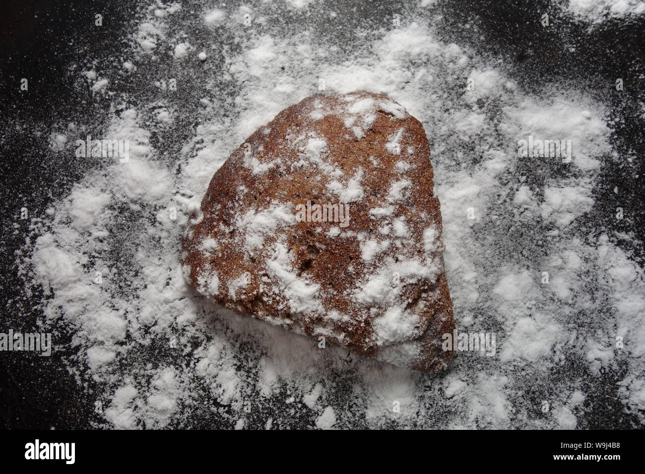 Stone rock covered by white snow and ice crystals. Aerial top view on ...