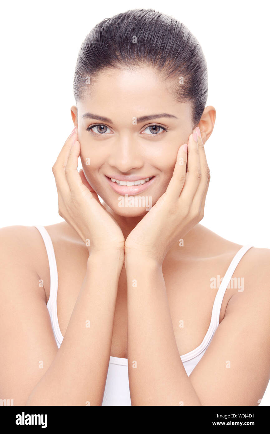 Hand covering cheek hi-res stock photography and images - Alamy