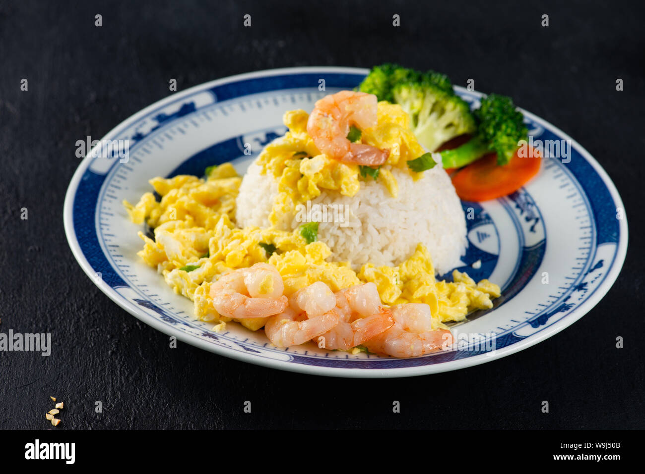 scrambled egg with rice with brocollli Stock Photo - Alamy