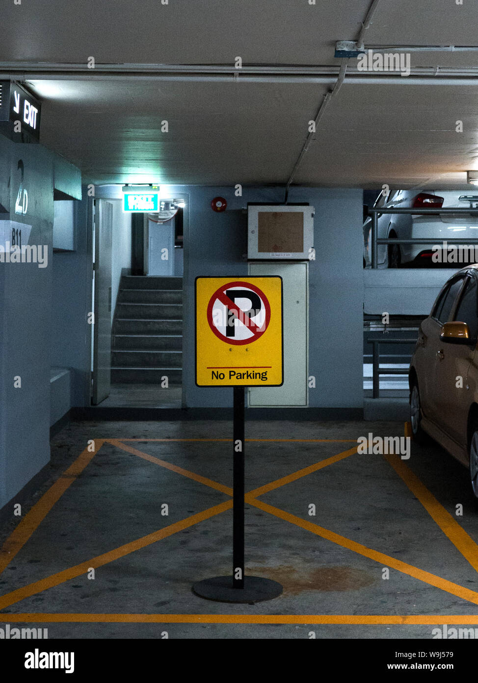 no parking traffic signs in parking lot Stock Photo - Alamy