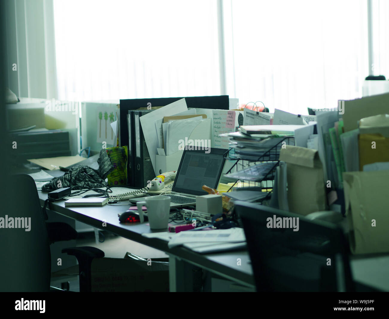 Office work place , Office clutter Stock Photo - Alamy