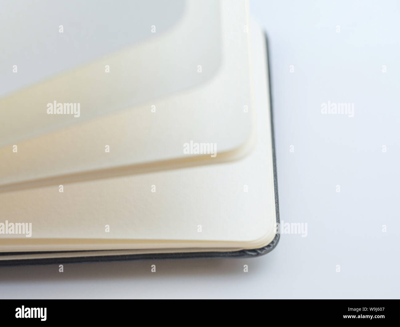 Open the notebook or book with empty pages on isolate white background ...