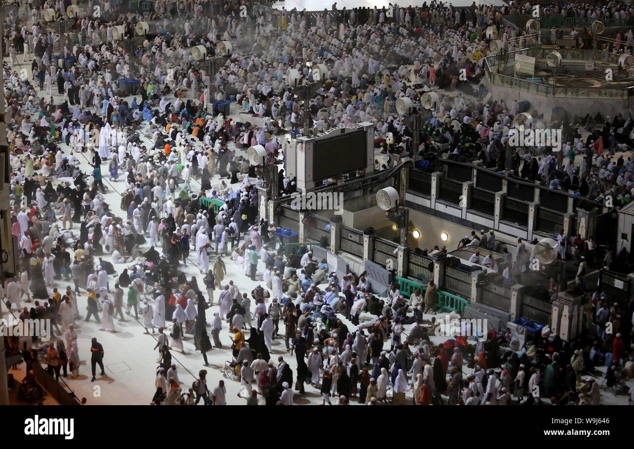 Mecca, Mecca, Saudi Arabia. 14th Aug, 2019. Muslim pilgrims pray around ...