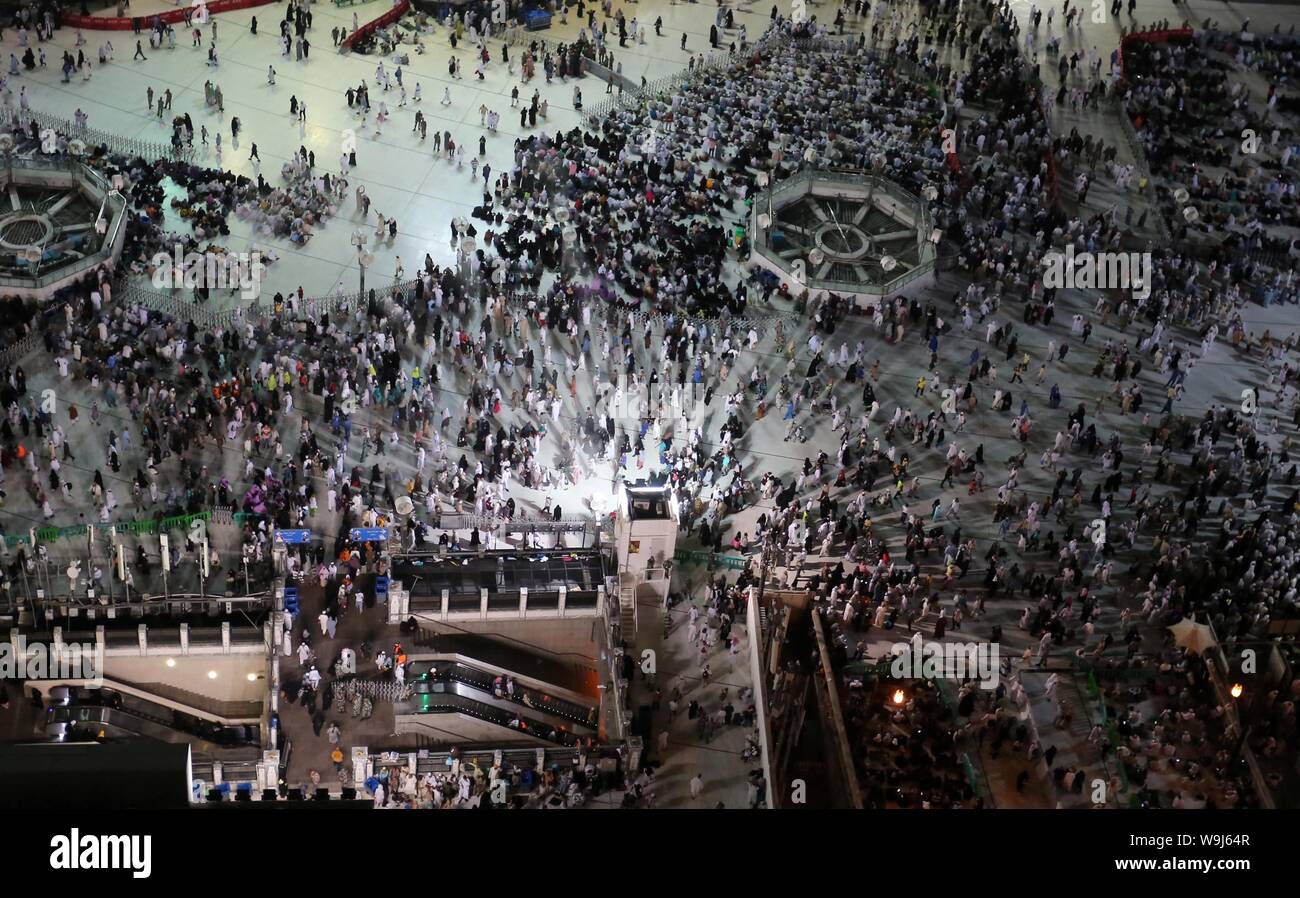 Mecca, Mecca, Saudi Arabia. 14th Aug, 2019. Muslim pilgrims pray around ...