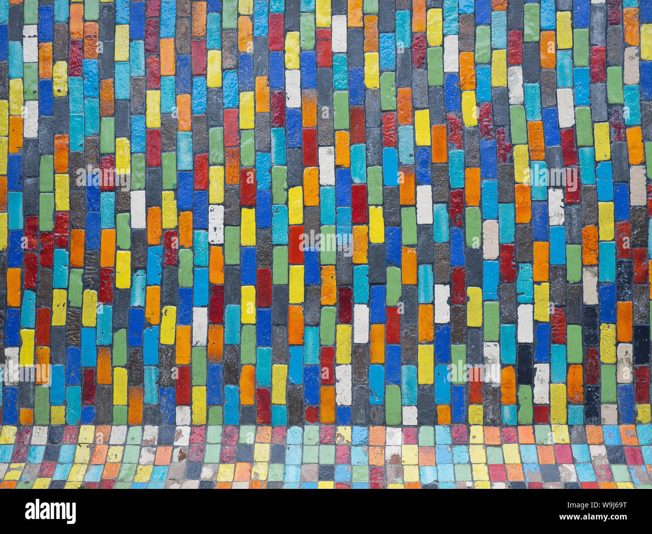 Multi-colored brick wall, many colored background, background texture ...