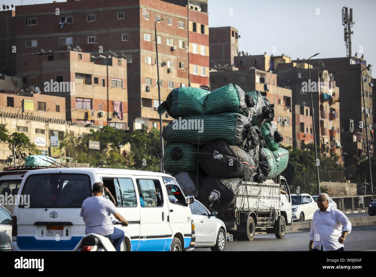 Il Cairo, Egypt. 15th July, 2019. A truck loaded with bags of rubbish ...
