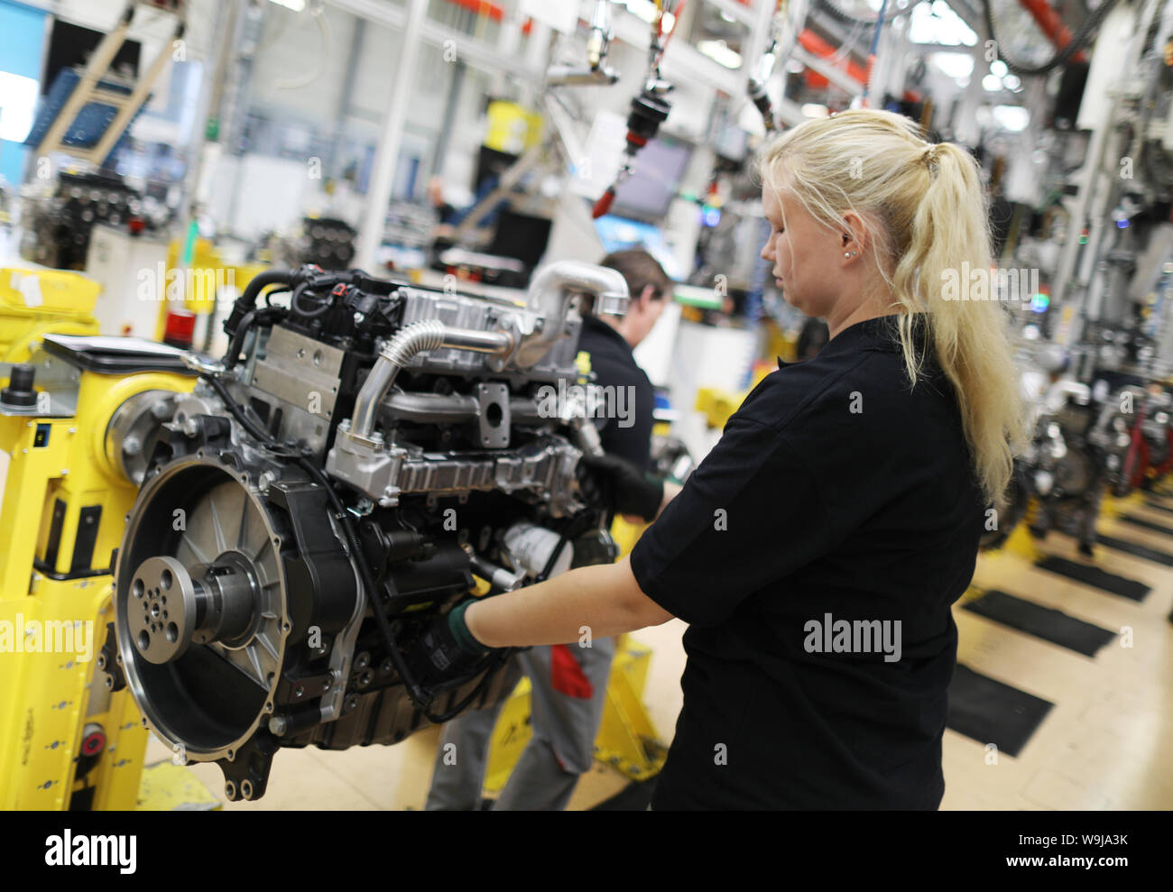 Cologne, Germany. 14th Aug, 2019. Employees of the engine manufacturer ...