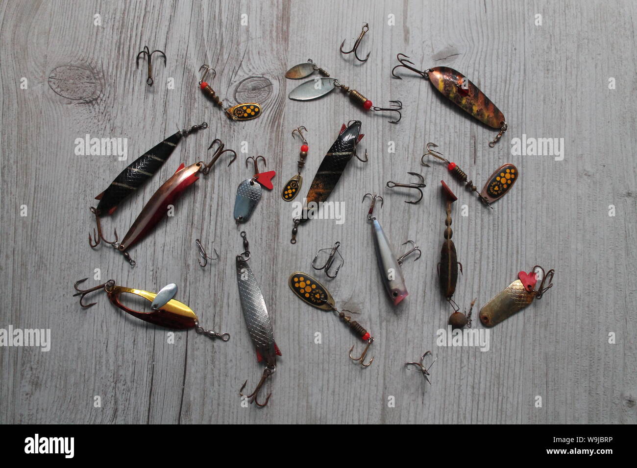 metal shine tools for fishing trip in summer weekend Stock Photo - Alamy