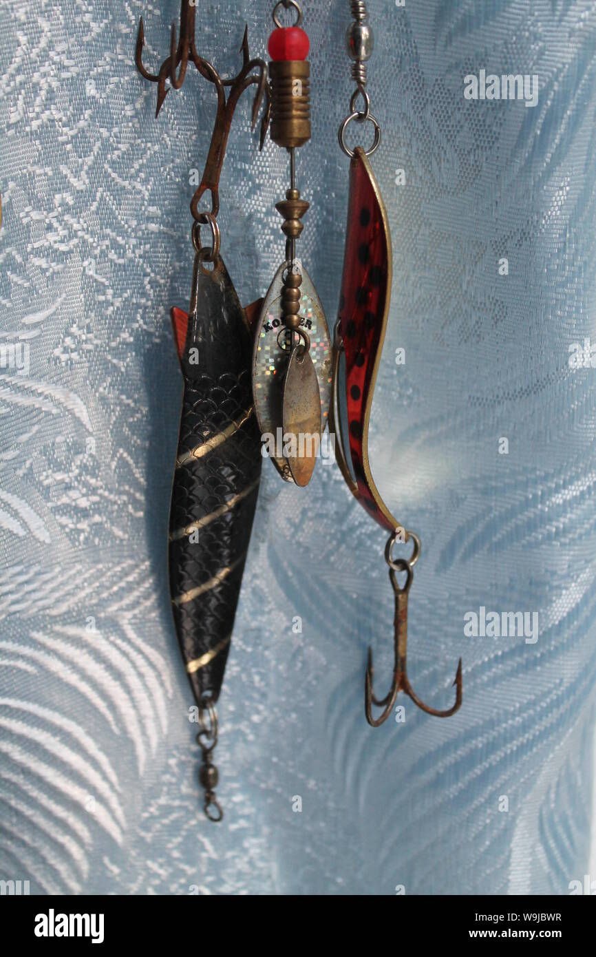 metal shine tools for fishing trip in summer weekend Stock Photo - Alamy