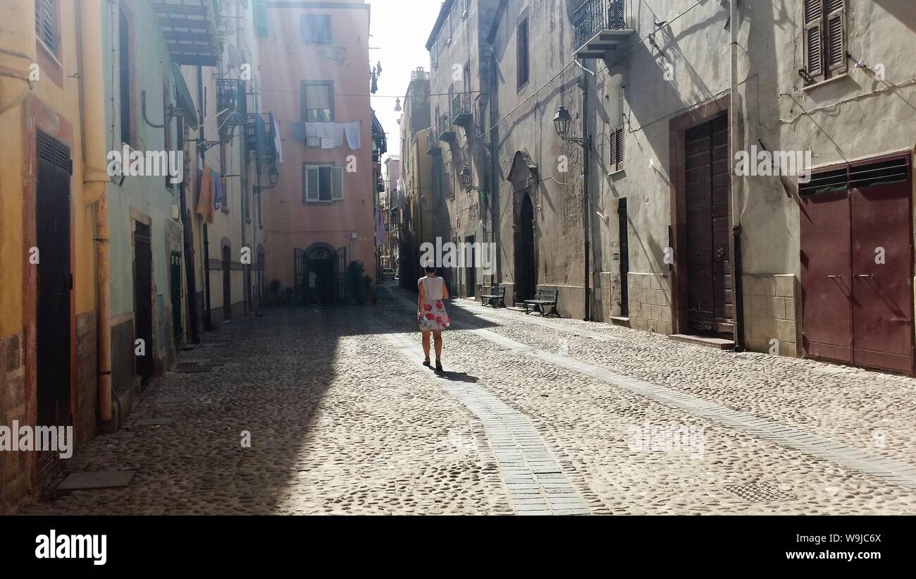 walking in a small town square Stock Photo - Alamy