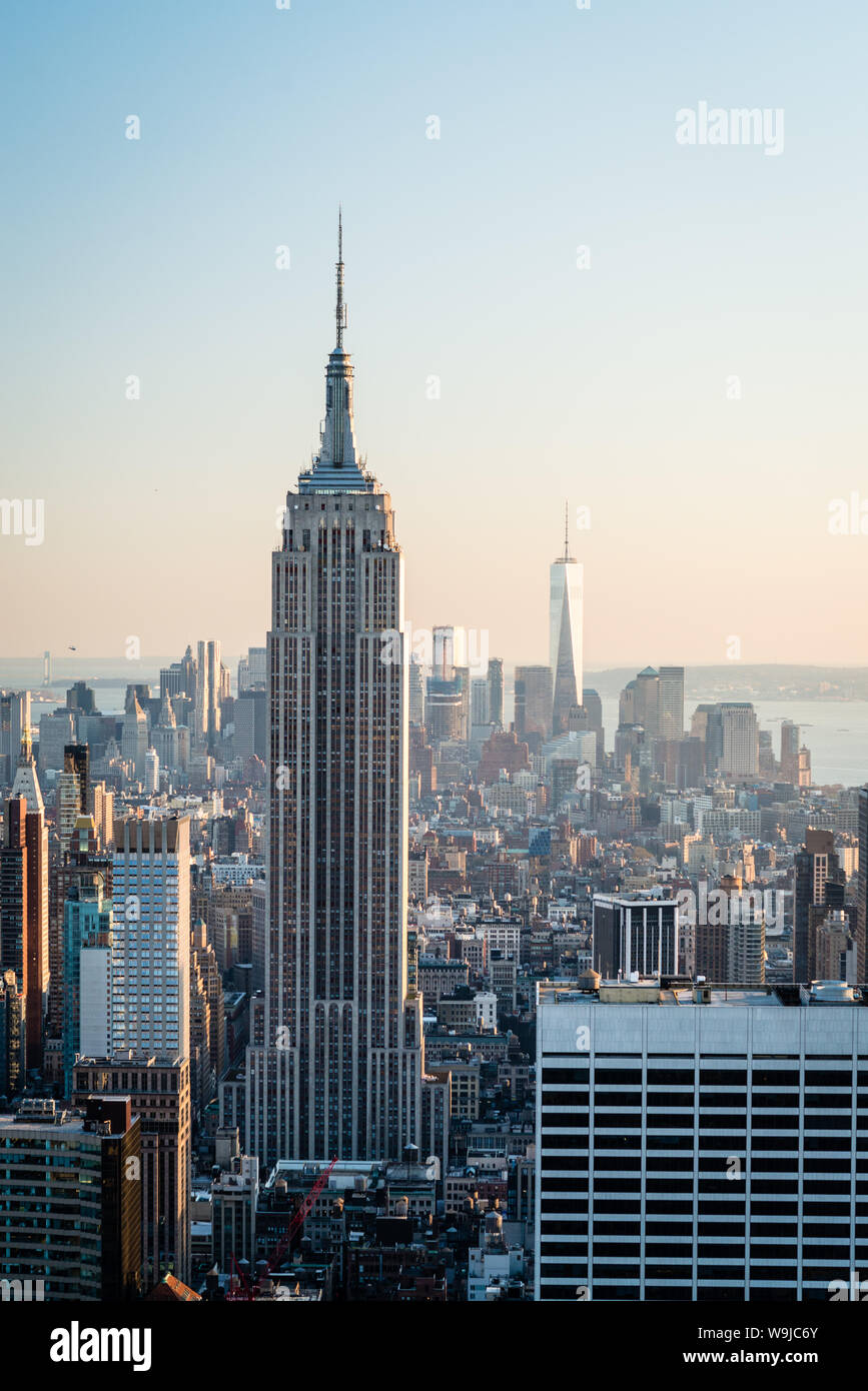 Empire State Building and downtown Manhatten at sun set seen from Top ...