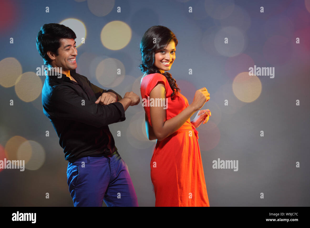 Young couple dancing at a nightclub Stock Photo - Alamy